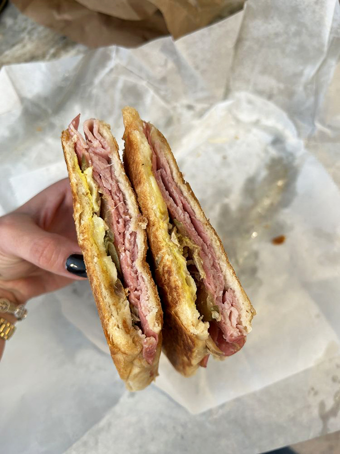 The Cuban sandwich here isn't messing around with that perfectly pressed bread and generous layers of ham, pork, and melted cheese.