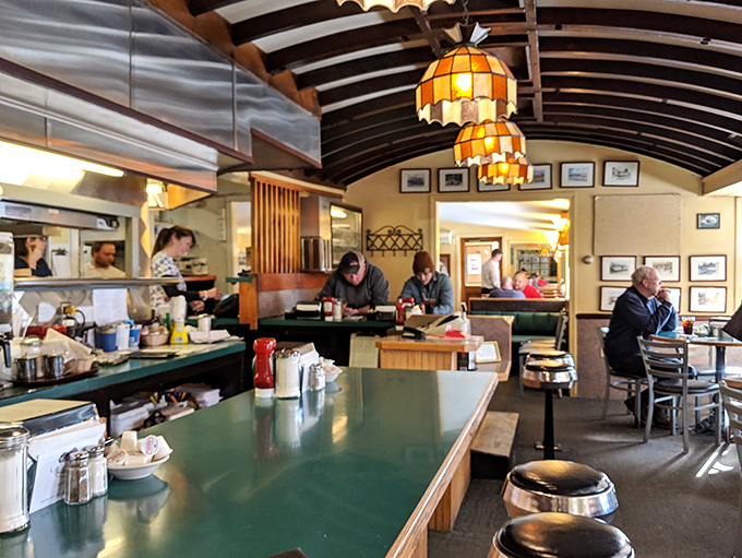 The cozy interior buzzes with locals and visitors alike, all united in their appreciation for good food and that unmistakable small-town diner atmosphere.