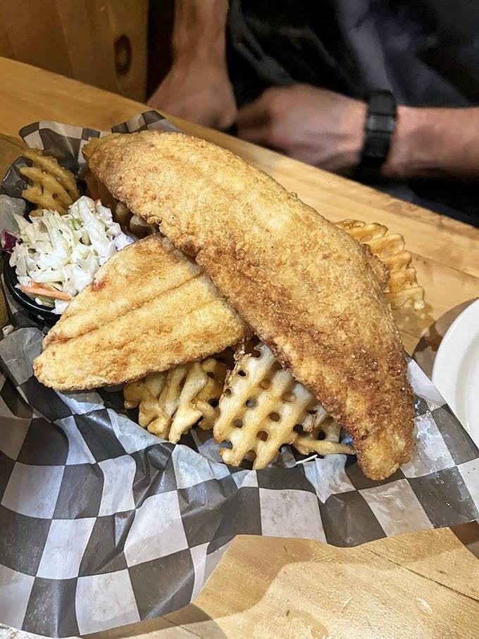 Golden-fried fish that shatters at first bite reveals pearly white flesh beneath &ndash; the perfect marriage of crispy exterior and tender heart.