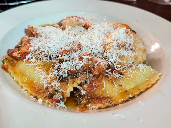 This goat cheese ravioli isn't just pasta &ndash; it's little pillows of joy swimming in a sauce so good you'll want to bottle it.