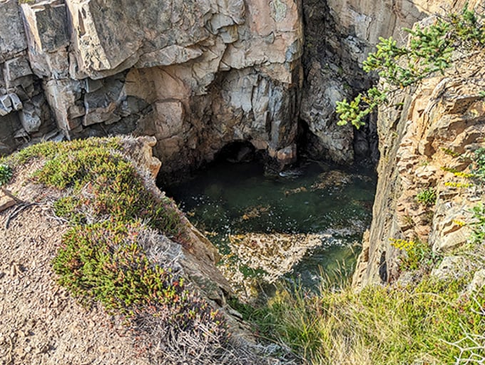 Mother Nature's infinity pool: crystal clear waters nestled between weathered granite walls create a natural sanctuary hidden from casual explorers.