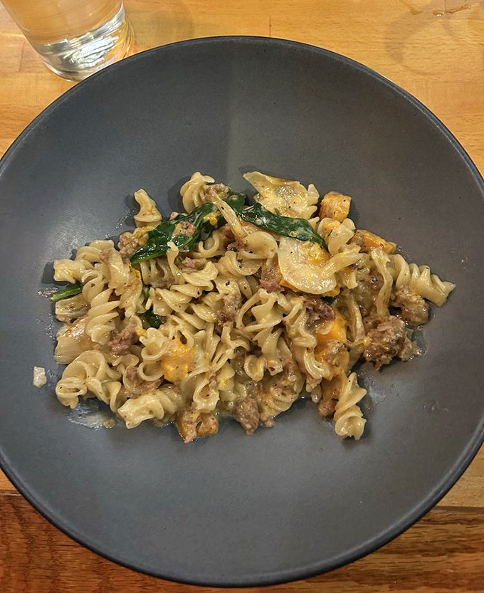 House-made pasta tangles with seasonal ingredients in a rustic bowl &ndash; comfort food elevated without losing its soul.