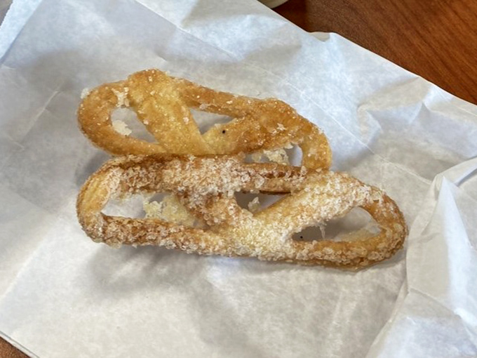 These Krakelingen aren't just twisted pretzels &ndash; they're sugary time machines transporting you straight to a Dutch street market with every crispy, sweet bite.