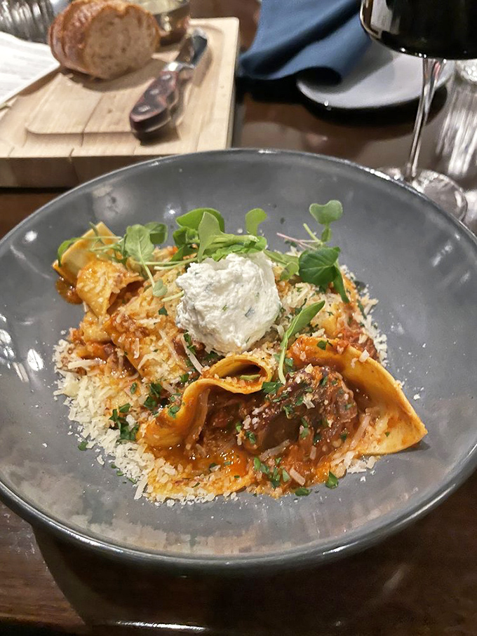 Tender pasta embraces slow-cooked lamb in this soul-warming dish, topped with a cloud of ricotta that melts into savory perfection.
