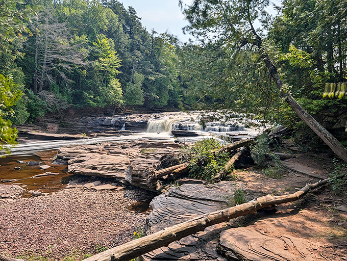 Manido Falls puts on a performance worthy of a standing ovation, tumbling dramatically over billion-year-old volcanic rock with theatrical flair.
