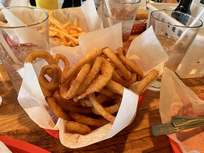 Golden onion rings that shatter with each bite, these crispy halos are what angels must snack on during celestial happy hours.