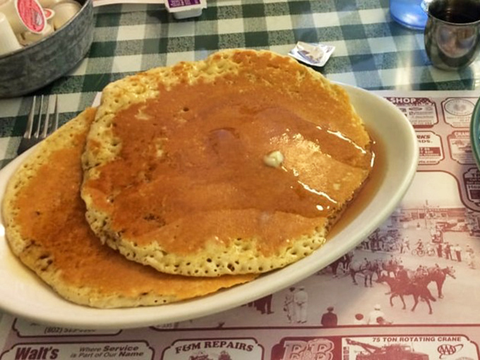 Golden pancakes so large they barely fit on the plate &ndash; a signature Brown Cow breakfast experience.