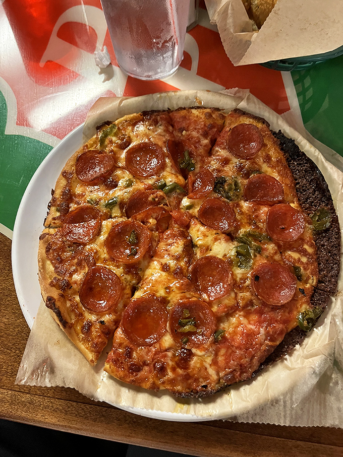 Pepperoni perfection! Each pie features a thin, crispy crust that somehow supports a mountain of toppings without surrendering.