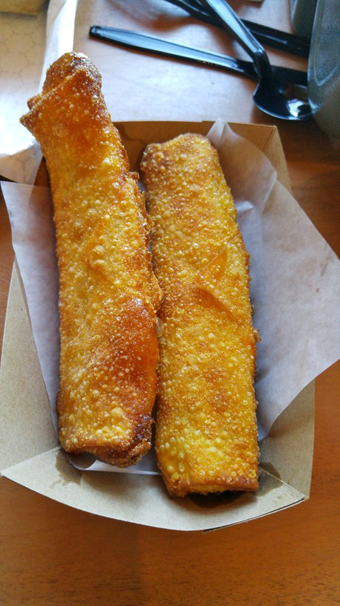 Golden-fried pickle poppers emerge from their crispy wonton wrapping like treasures, promising a perfect crunch followed by a tangy surprise.