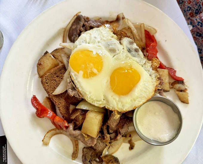 Prime Rib Hash: Yesterday's prime rib transformed into today's breakfast masterpiece&mdash;crispy potatoes, tender beef, and those perfect sunny-side eggs creating liquid gold.
