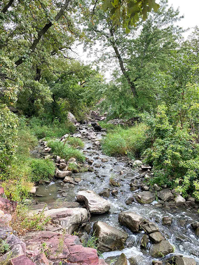 Crystal clear waters dance over smooth stones, carving their patient path just as they have for thousands of years.