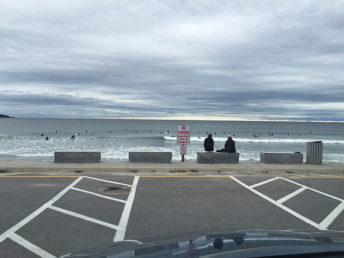 Ocean-front parking with a view &ndash; Maine's surf beckons while beachgoers watch from concrete perches.