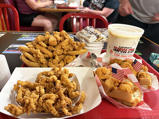 A feast fit for Neptune himself! Golden treasures from the sea, perfectly fried and practically overflowing their containers.