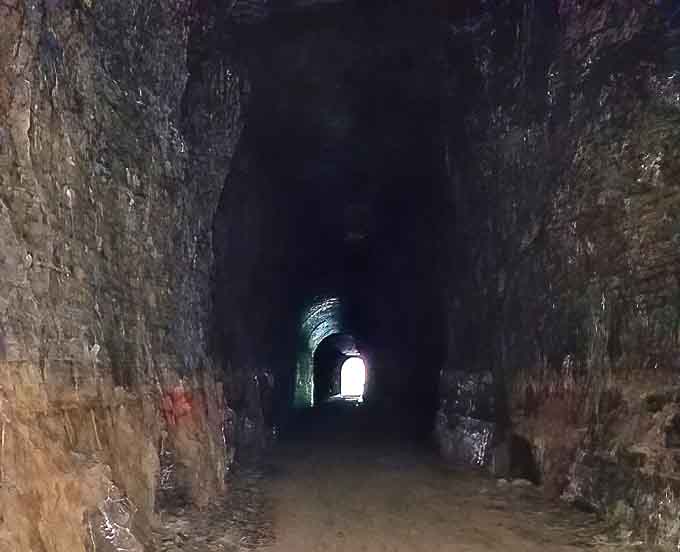 Looking toward the light at tunnel's end &ndash; a journey through darkness that rewards patience with illumination.