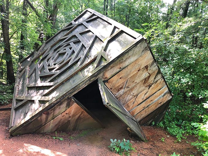 Like a geometric puzzle tumbling into itself, "The American Status" challenges perspectives while creating an impossible architectural fantasy.