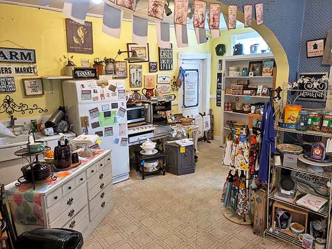 The former kitchen now bursts with culinary treasures and home accessories, where yellow walls and blue archways create cheerful shopping spaces.