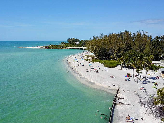 Beach: Sanibel's pristine shoreline stretches into the distance, where the turquoise water meets a sky so blue it seems unreal.