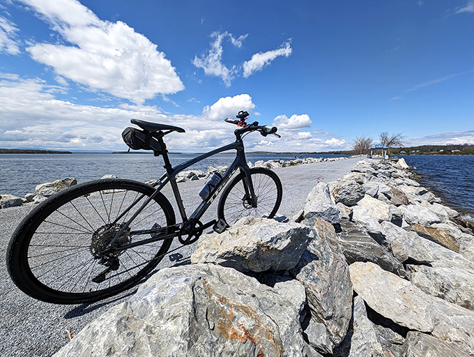 Adventure awaits on two wheels where the causeway meets the sky, proving Vermont isn't just about mountains and maple syrup.