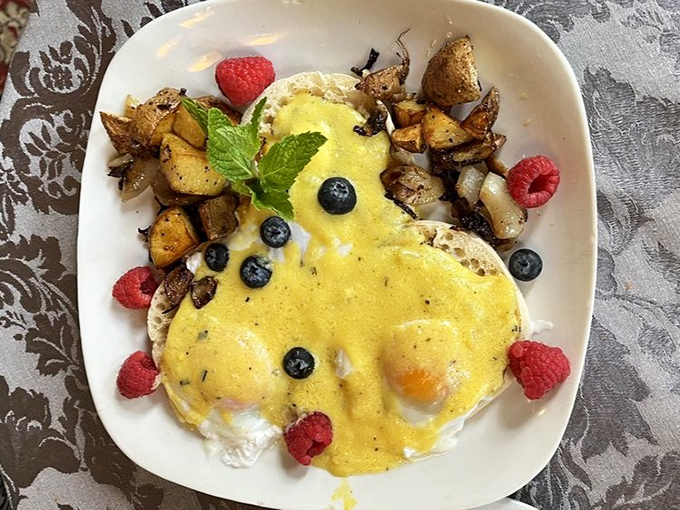 Breakfast gets the royal treatment with these perfectly poached eggs, hollandaise that's practically liquid gold, and berries fresh enough to curtsy.
