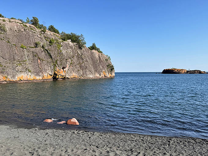 Tranquility speaks volumes at Black Beach, where the lake whispers secrets to shores unlike any in the Midwest.