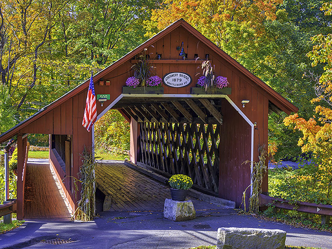 Creamery Covered Bridge stands as a postcard-perfect reminder of Vermont's architectural heritage, especially stunning when autumn leaves frame its weathered wood.