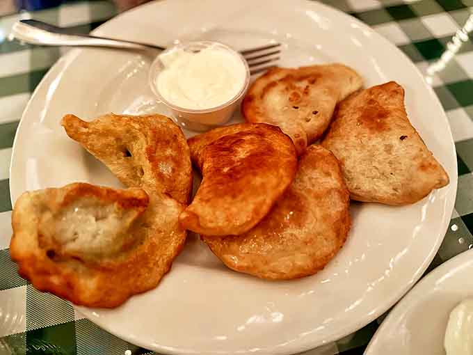 Golden-fried pierogi with perfectly crimped edges &ndash; these little pockets of joy are what food dreams are made of.