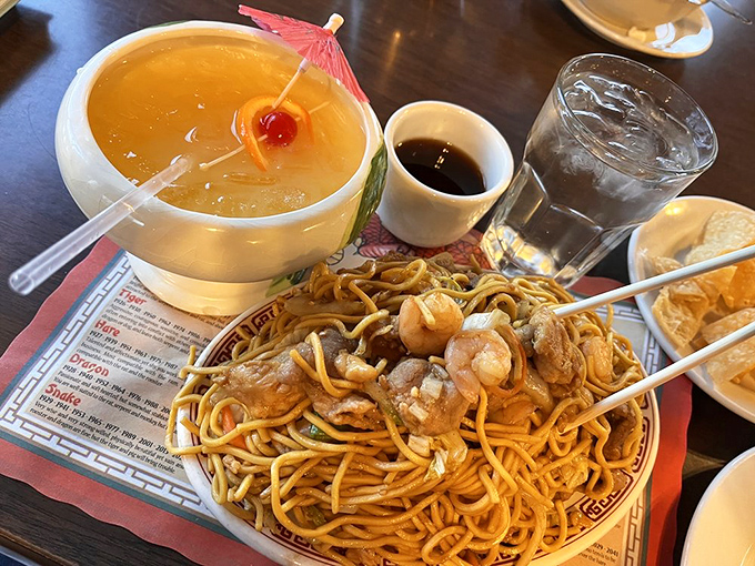 This mountain of lo mein isn't just noodles &ndash; it's a tangle of happiness with shrimp playing hide-and-seek among the strands.