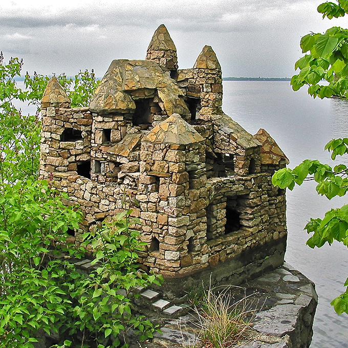 Perched dramatically at water's edge, this miniature fortress seems to guard Lake Champlain like something from a medieval fairy tale.