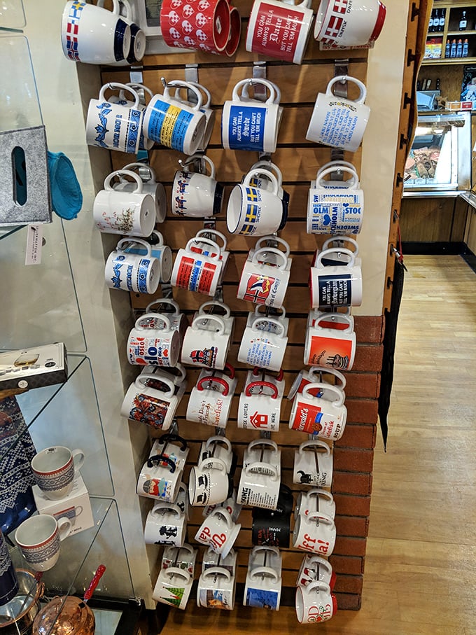 A wall of mugs showcases Nordic humor and heritage &ndash; because coffee tastes better with a side of Scandinavian wit.