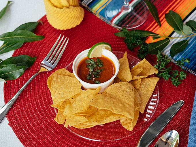 Simple pleasures done right: Golden tortilla chips surrounding a vibrant salsa &ndash; the ideal companion while contemplating which wine flight to try next.