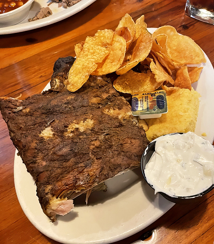 Fall-off-the-bone ribs share the spotlight with house-made potato chips &ndash; a symphony of textures that dance across your palate.