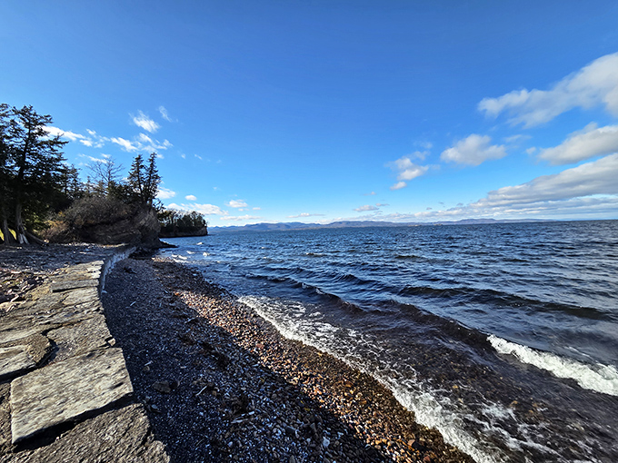 Nature's perfect meeting place: Lake Champlain's rocky shore tells geological stories spanning millions of years.