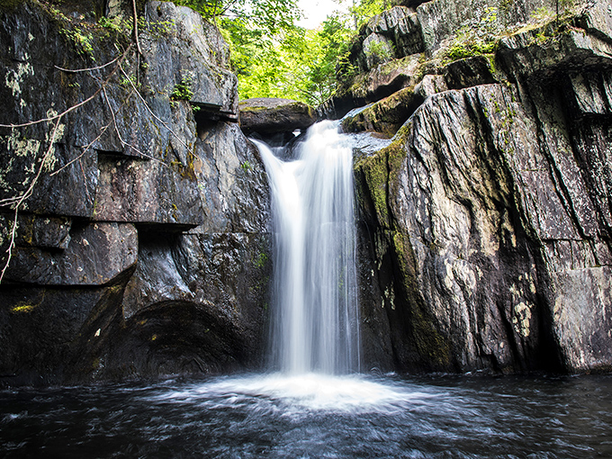 Water meets rock in a timeless dance, creating this silky cascade that photographers travel miles to capture.