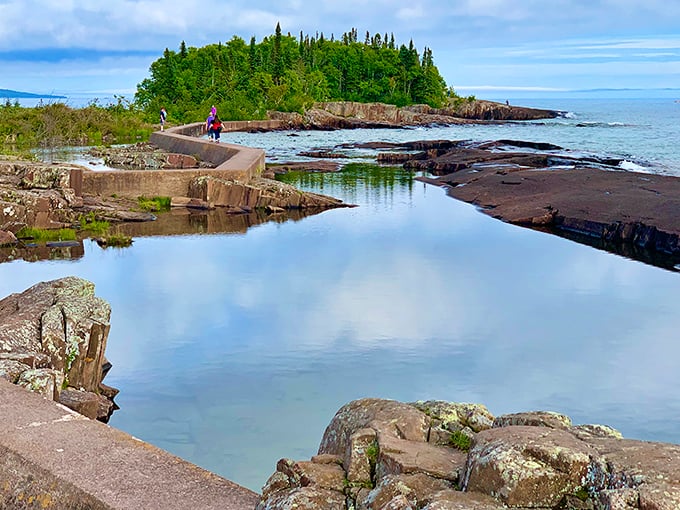 Nature's infinity pool? This stunning rock formation creates a perfect mirror for the sky, proving Mother Nature is Minnesota's best architect.
