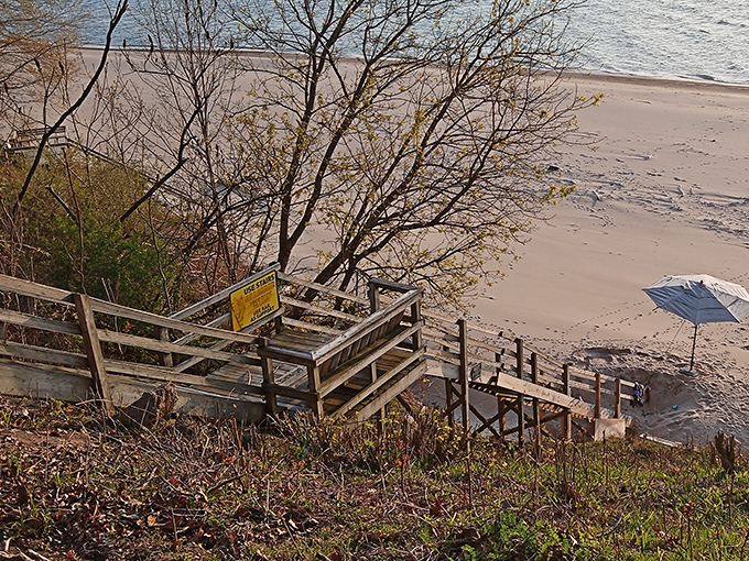 Wooden steps descend to paradise, each one bringing you closer to a shoreline where history washes up with every wave.