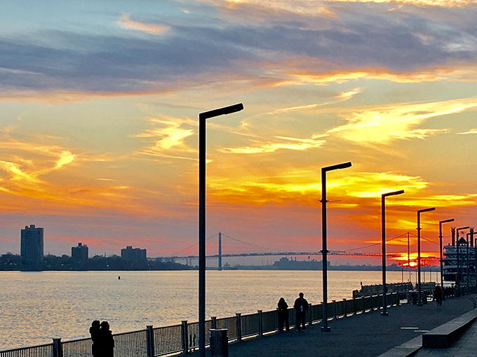 Mother Nature showing off at sunset, painting the sky in impossible colors while the Ambassador Bridge stretches toward Canada like a reaching hand.