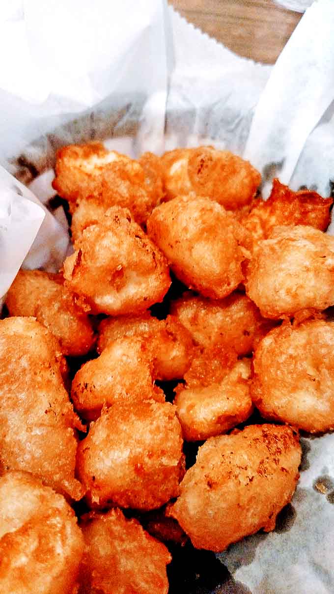 Cheese curds that could make a Frenchman weep &ndash; golden-battered nuggets of Wisconsin pride with that perfect, satisfying cheese pull.