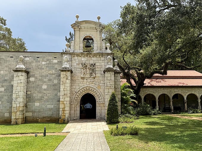 The Ancient Spanish Monastery's stone entrance transports visitors eight centuries back in time, a medieval European treasure hiding in plain sight in Miami.