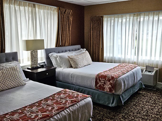 Cozy accommodations: Soft beds with floral accents invite weary travelers to rest while dreaming of tomorrow's lakeside adventures.