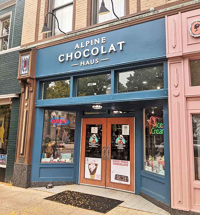 Alpine Chocolat Haus's distinctive blue storefront brings European chocolate traditions to downtown Gaylord. Those wooden doors open to a world of sweet possibilities!