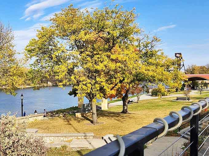 Hastings' riverside walkway offers perfect Mississippi views, autumn trees adding splashes of gold to the peaceful scene.