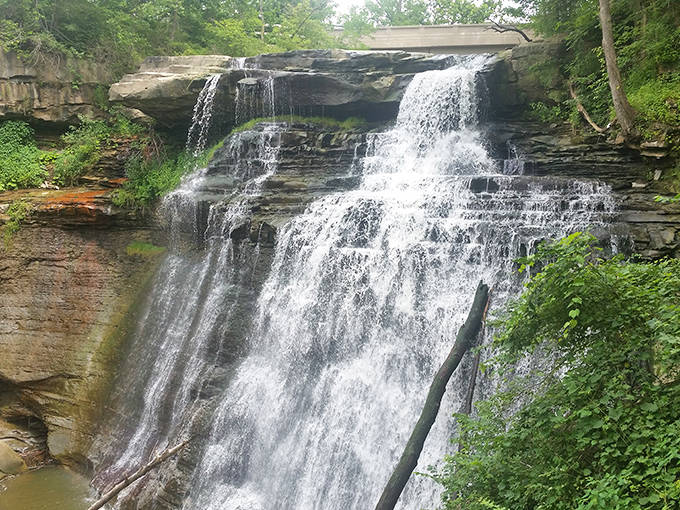 Cuyahoga's gentle cascades flow over stepped rock formations, a peaceful scene that belies the river's fiery industrial past.