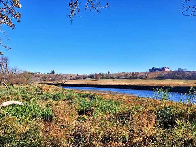 The river winds through Kilen Woods State Park, creating dramatic landscapes that blend history with natural splendor.