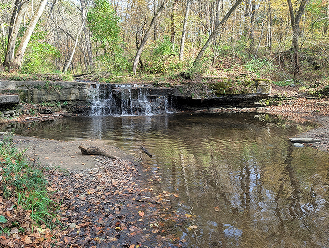 Multiple streams flow over the limestone ledge at Caron Falls, creating a natural water feature that no landscape designer could ever match.