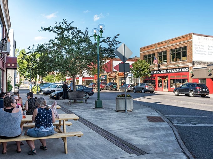 Charming storefronts line Duluth's main street, inviting visitors to explore local shops while the massive lake shimmers just blocks away.