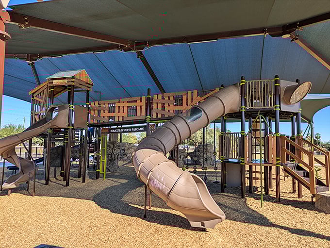 Homestead North Park's massive play structure invites endless exploration. That twisty tube slide promises giggles all the way down.