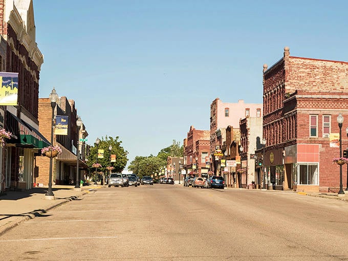 The wide, historic main street of Pipestone offers a glimpse into Minnesota's past with its beautifully preserved buildings.