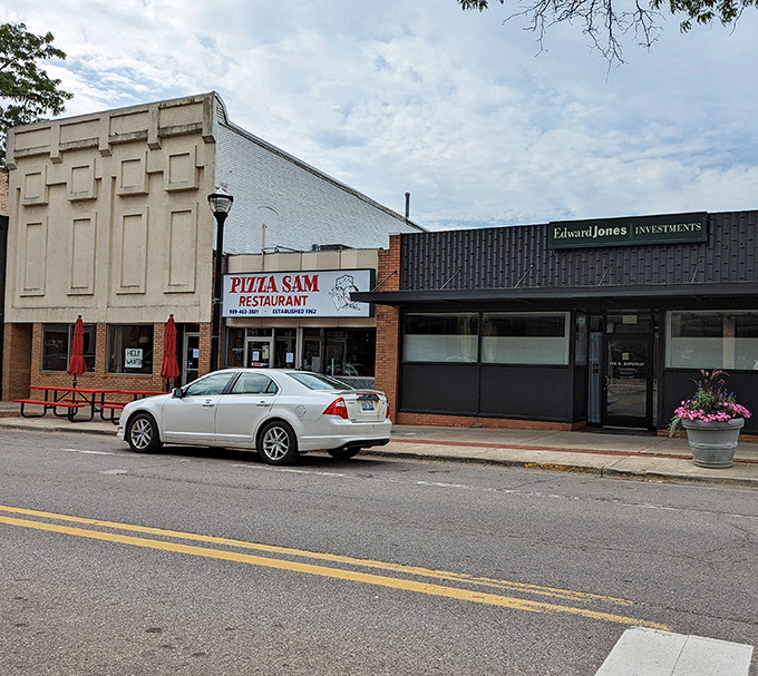 Pizza Sam's classic brick fa&ccedil;ade blends into Alma's historic downtown, where generations have gathered for their famous pies and hometown atmosphere.