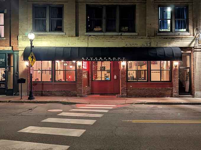 That warm glow from inside tells you everything you need to know about the welcoming atmosphere waiting for you.