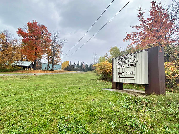 The town sign might be simple, but Searsburg's backdrop of autumn colors and rolling hills speaks volumes about Vermont's unspoiled landscape.